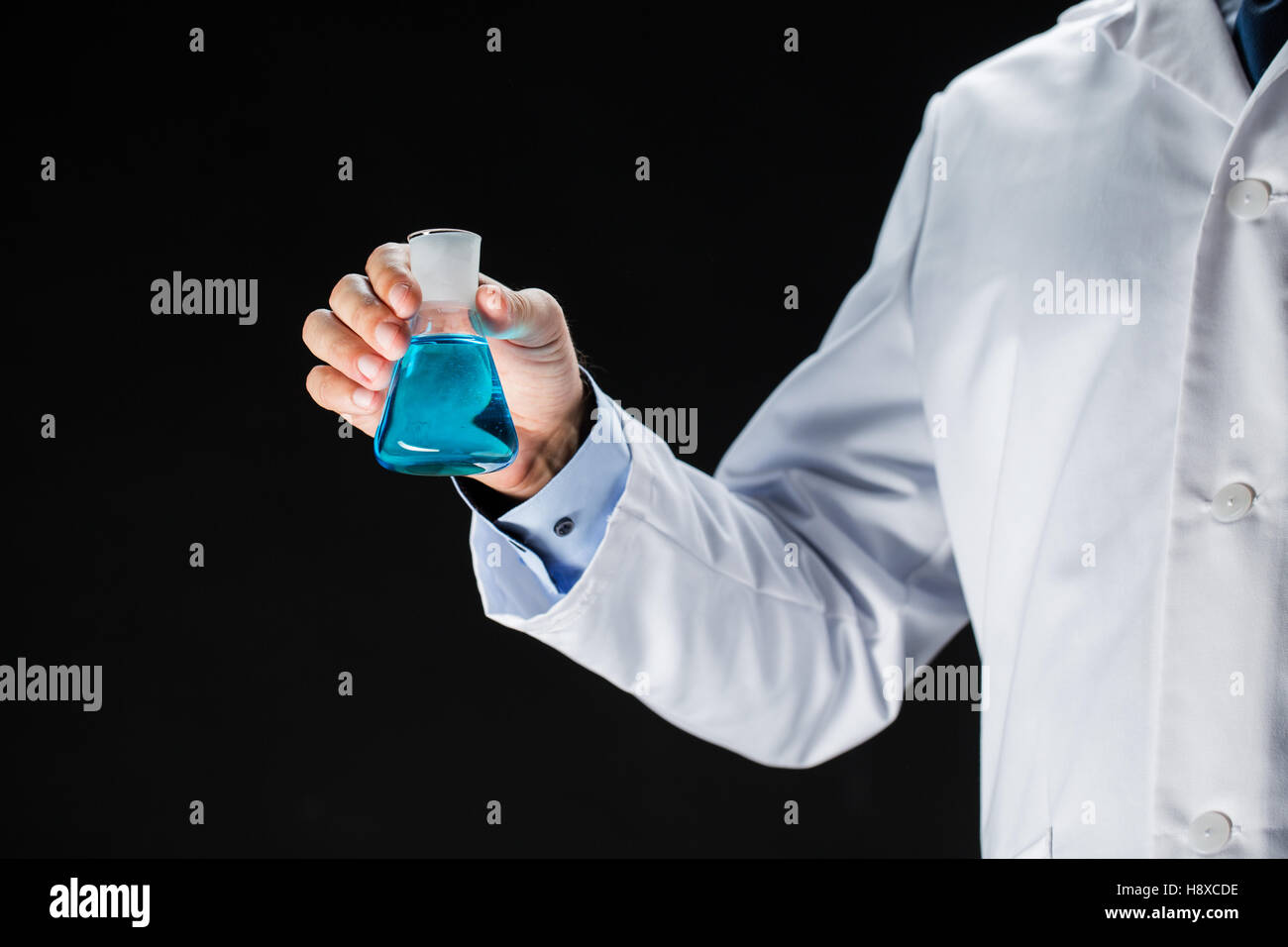Hand holding chemical flask isolated hi-res stock photography and ...