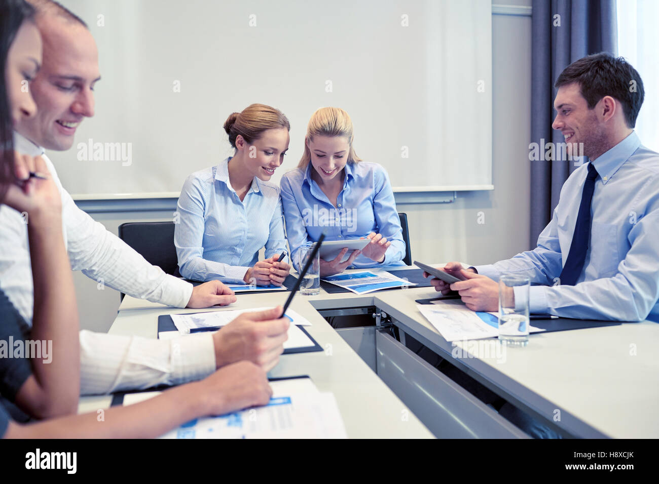 smiling business people meeting in office Stock Photo - Alamy