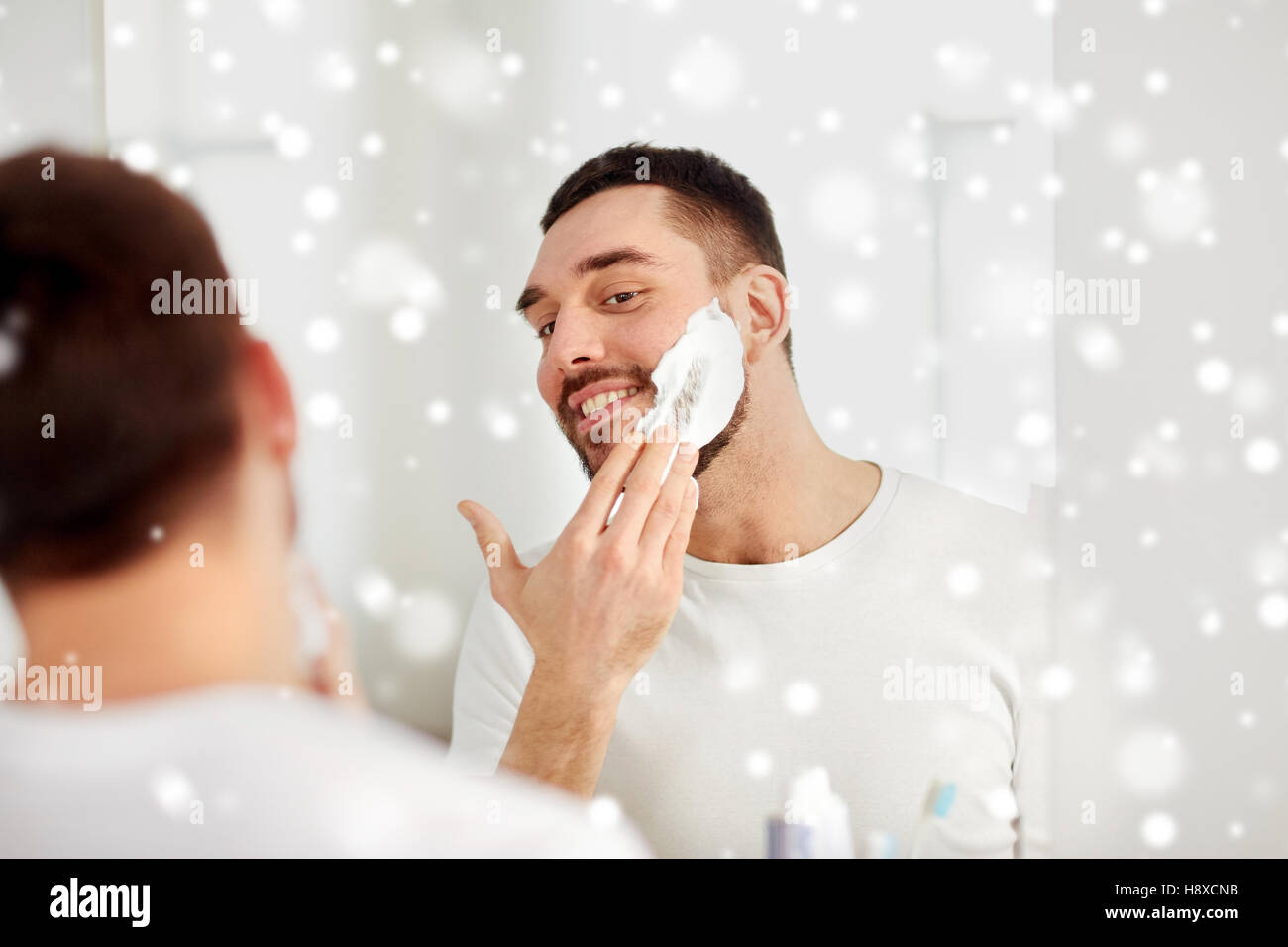 happy man applying shaving foam at bathroom mirror Stock Photo - Alamy