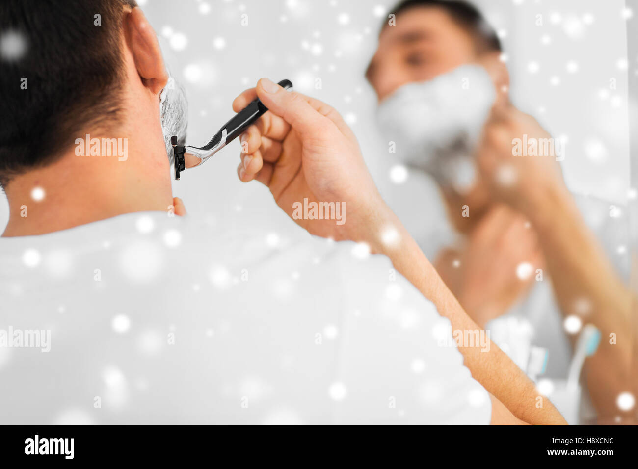 Closeup young man shaving beard hi-res stock photography and images - Alamy