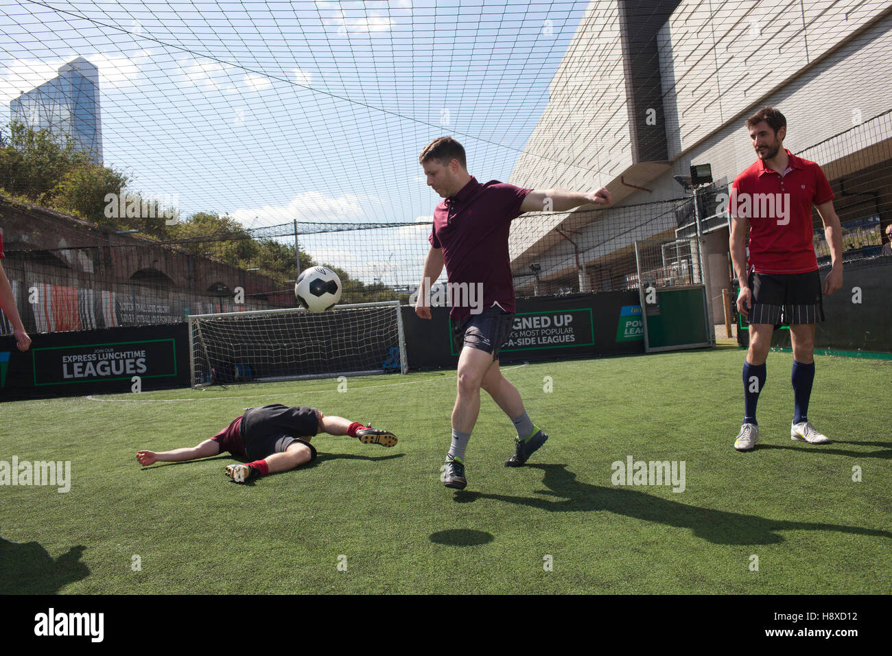 Shooting practice during a football training session on an all weather ...