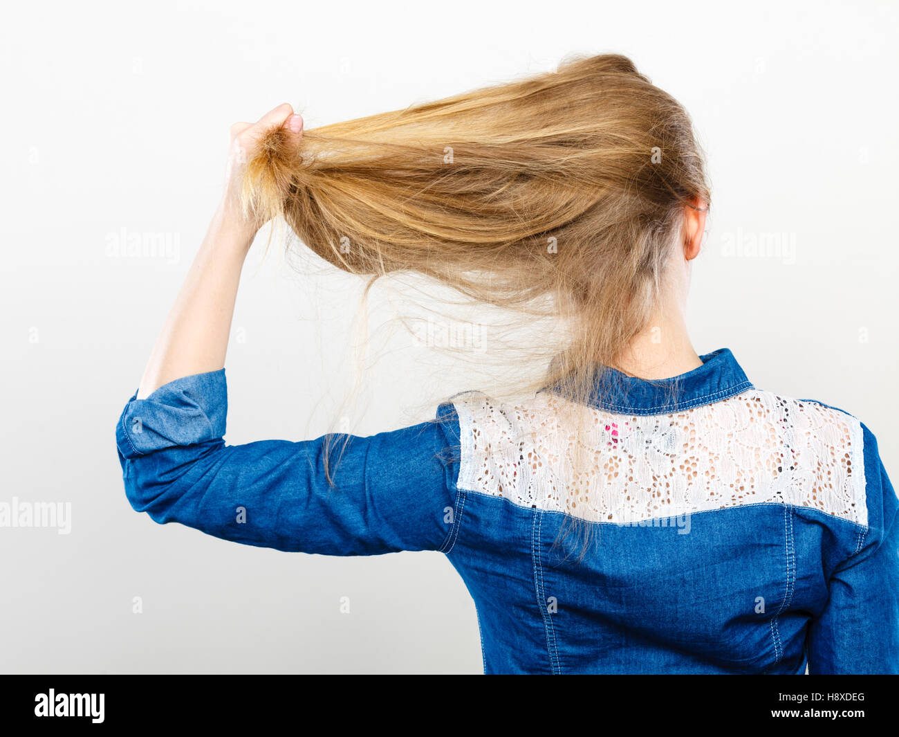 Hairstyle and hairdo. Haircare concept. Back view of blonde woman ...