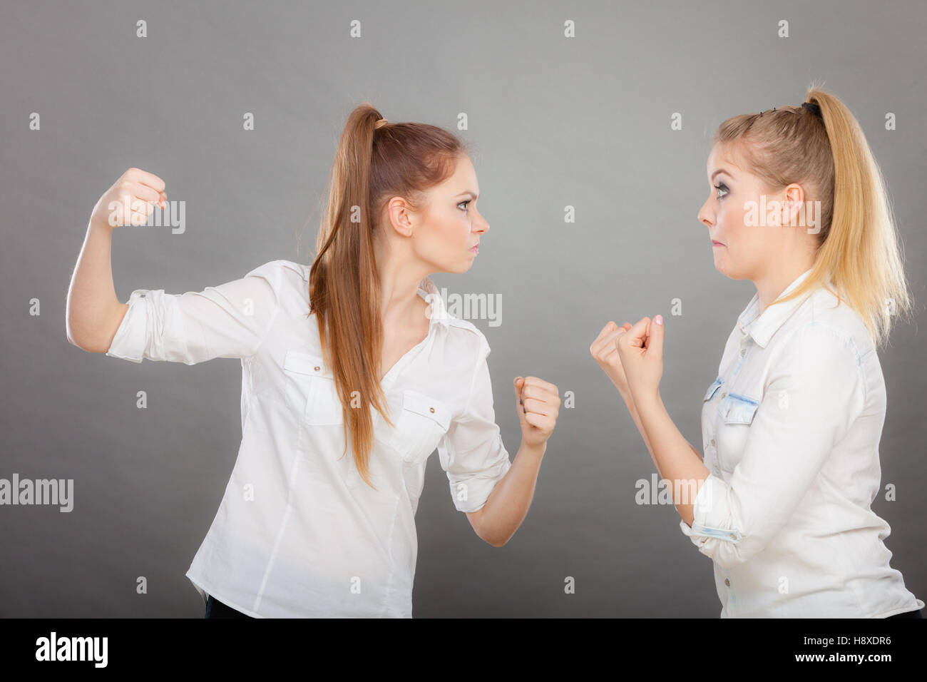 Conflict, bad relationships, friendship difficulties. Two young women ...