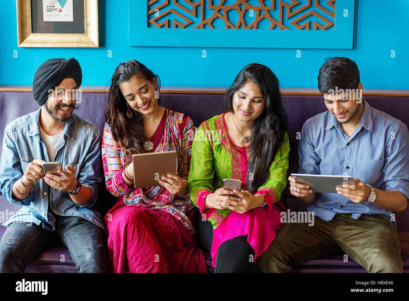 Friends Technology Devices Happy Concept Stock Photo - Alamy