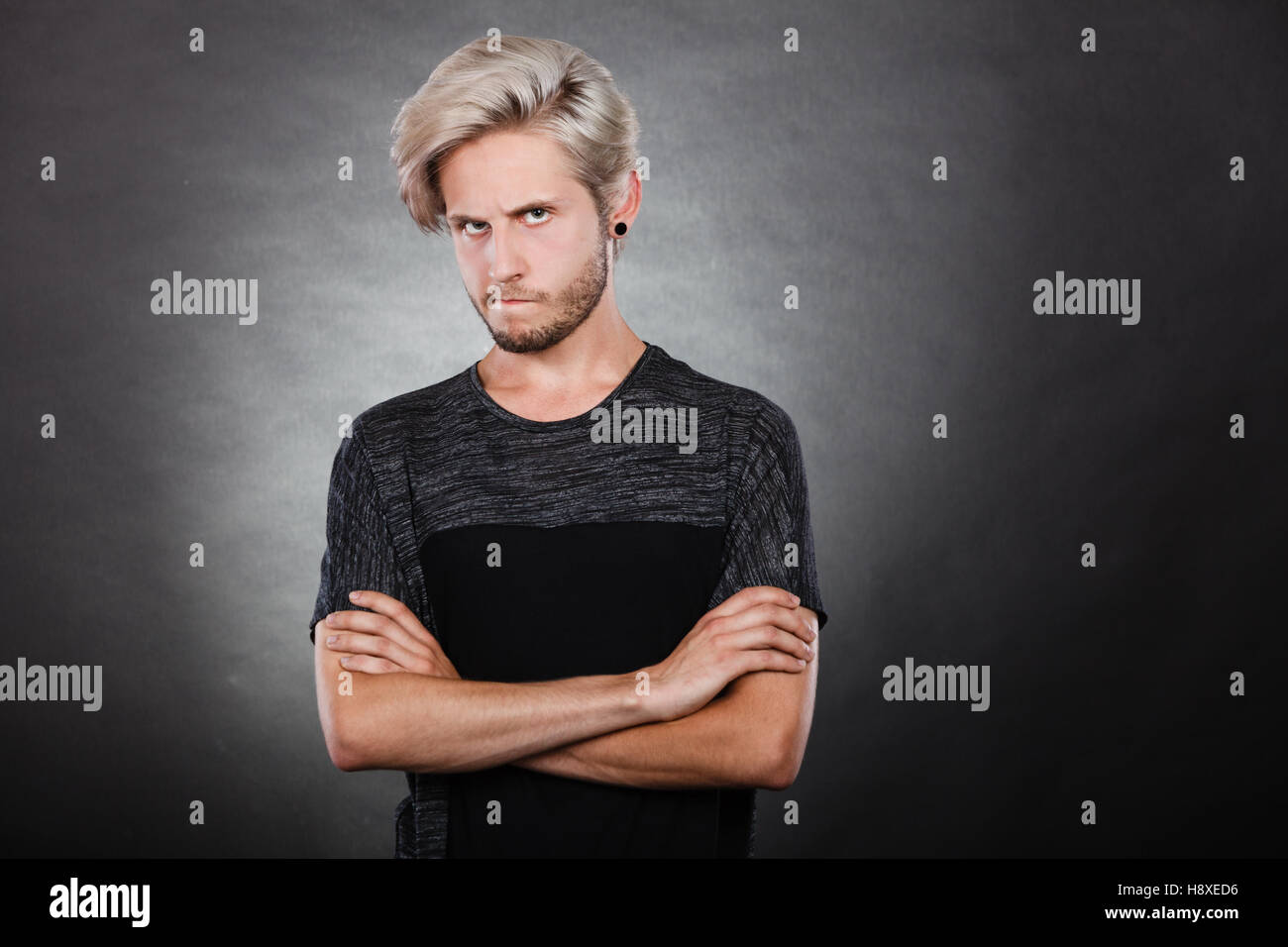 Grumpy Man Folded Arms High Resolution Stock Photography and Images - Alamy