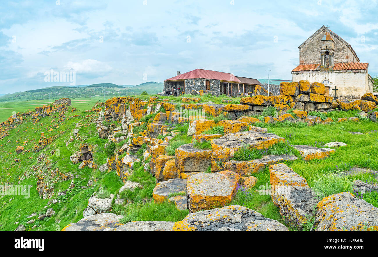 The medieval women Monastery on the mountain top, surrounded by ruins ...
