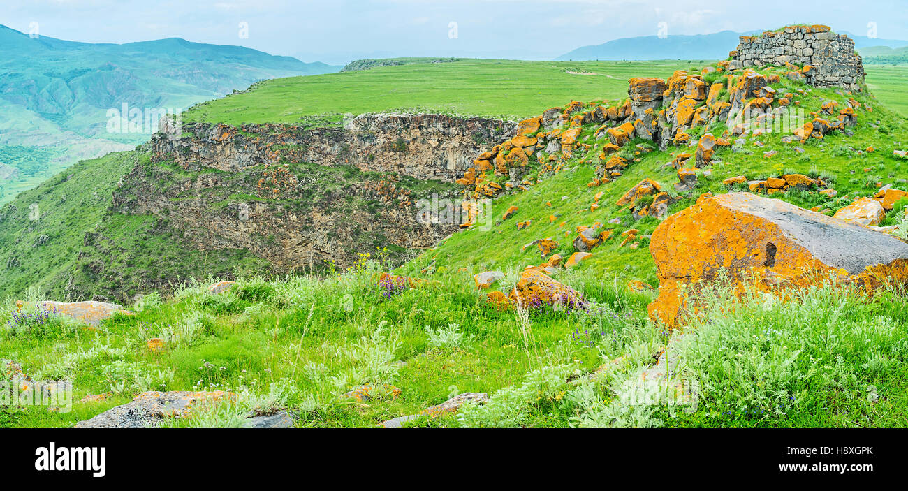 The remainings of the old fortress, located on the green tableplain ...