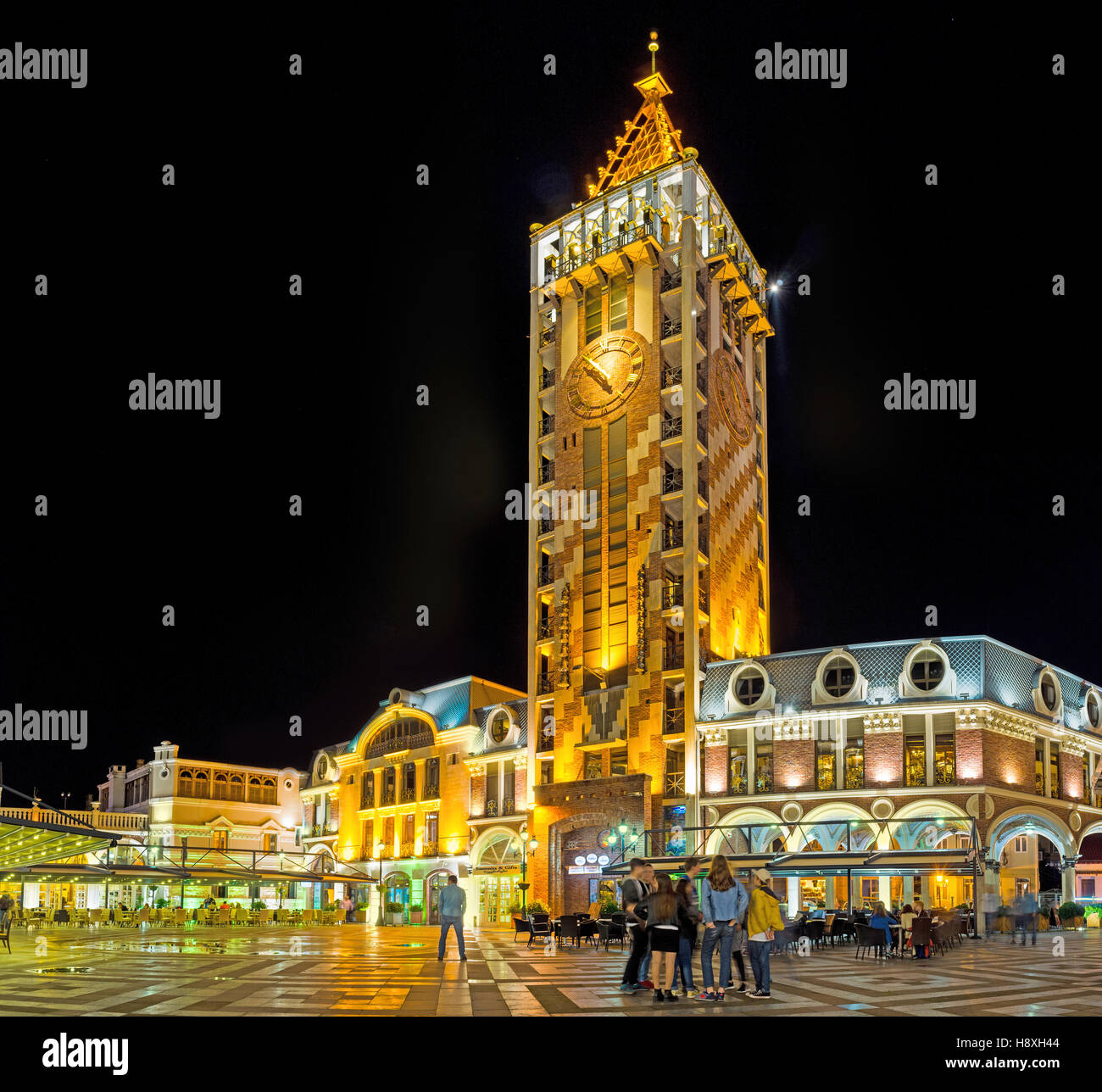 The high clock tower of Piazza Inn, located on the Piazza Square and ...