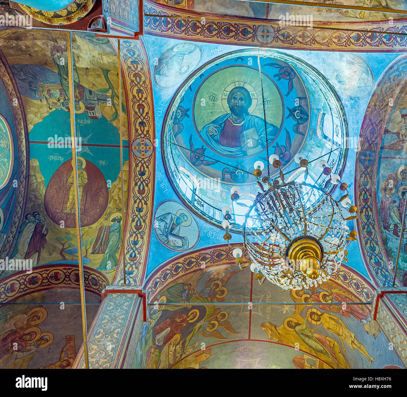 The bright blue cupola with the old frescoes in Greek Orthodox St ...