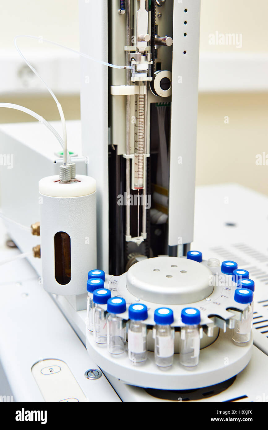 Biochemical analyzer with turret in science laboratory Stock Photo - Alamy
