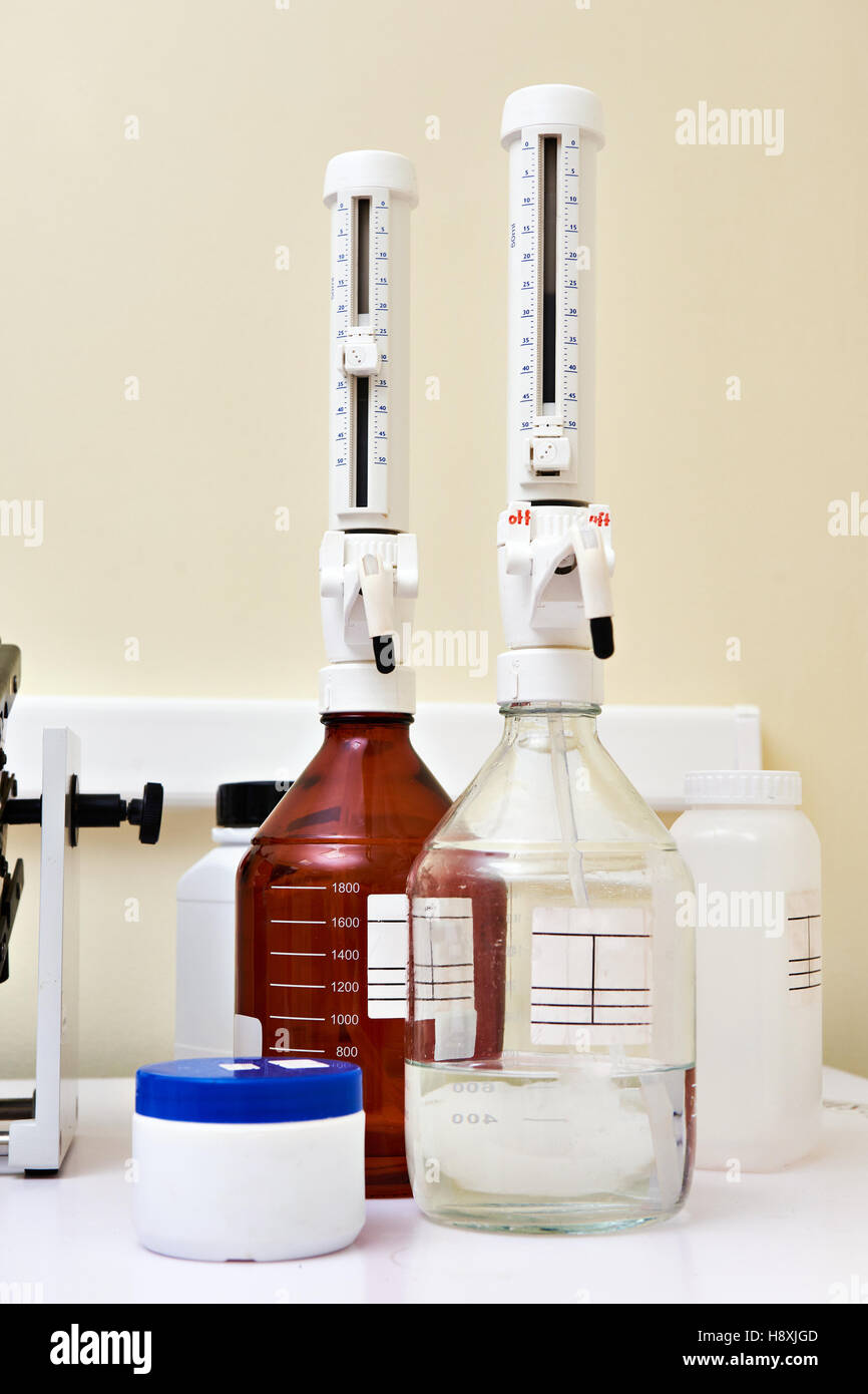 Bottles with top dispenser in the biochemical laboratory Stock Photo ...