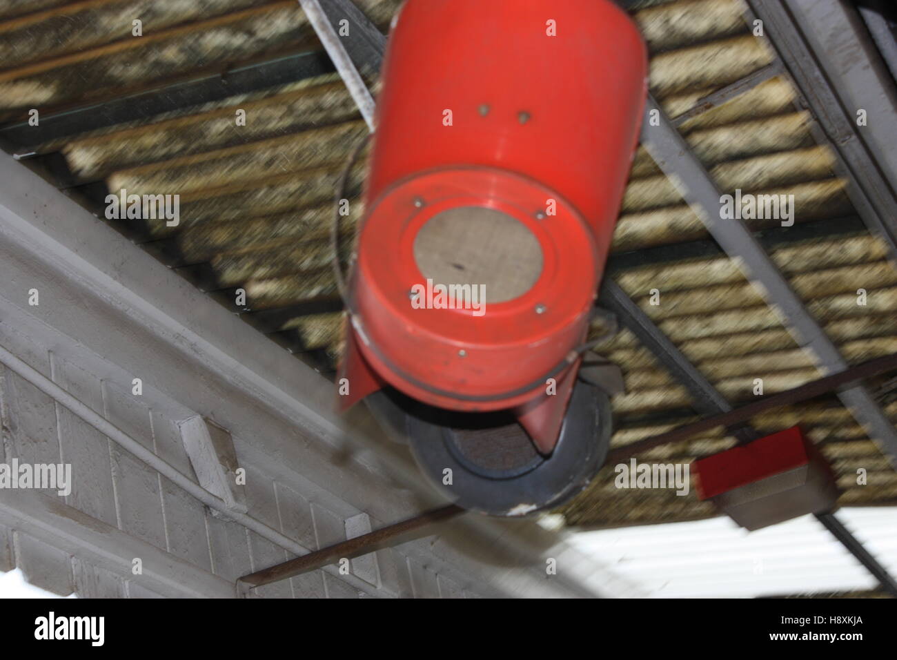 Railway station platform red light fitting Stock Photo - Alamy