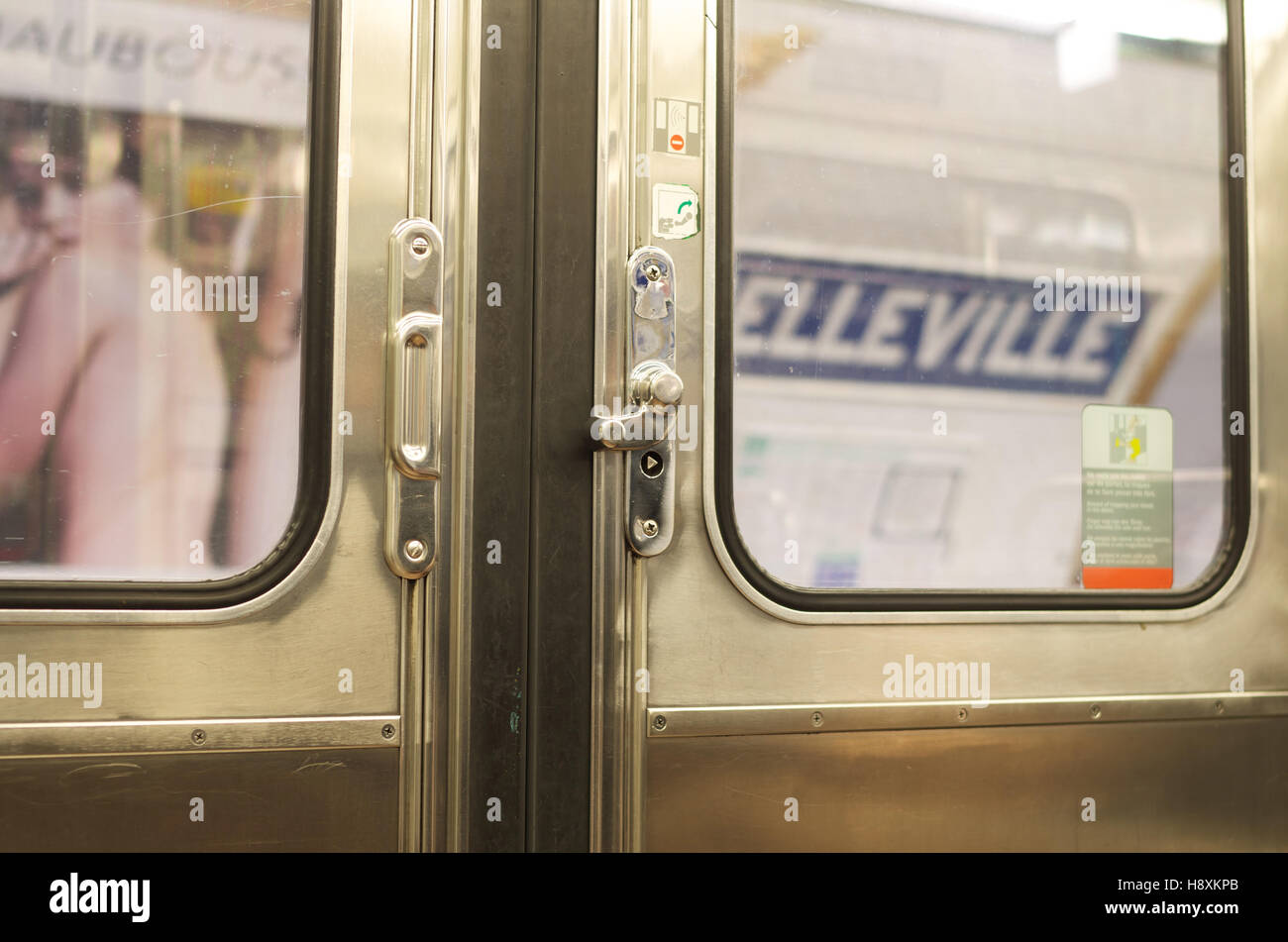 Paris Metro train door handles Stock Photo - Alamy