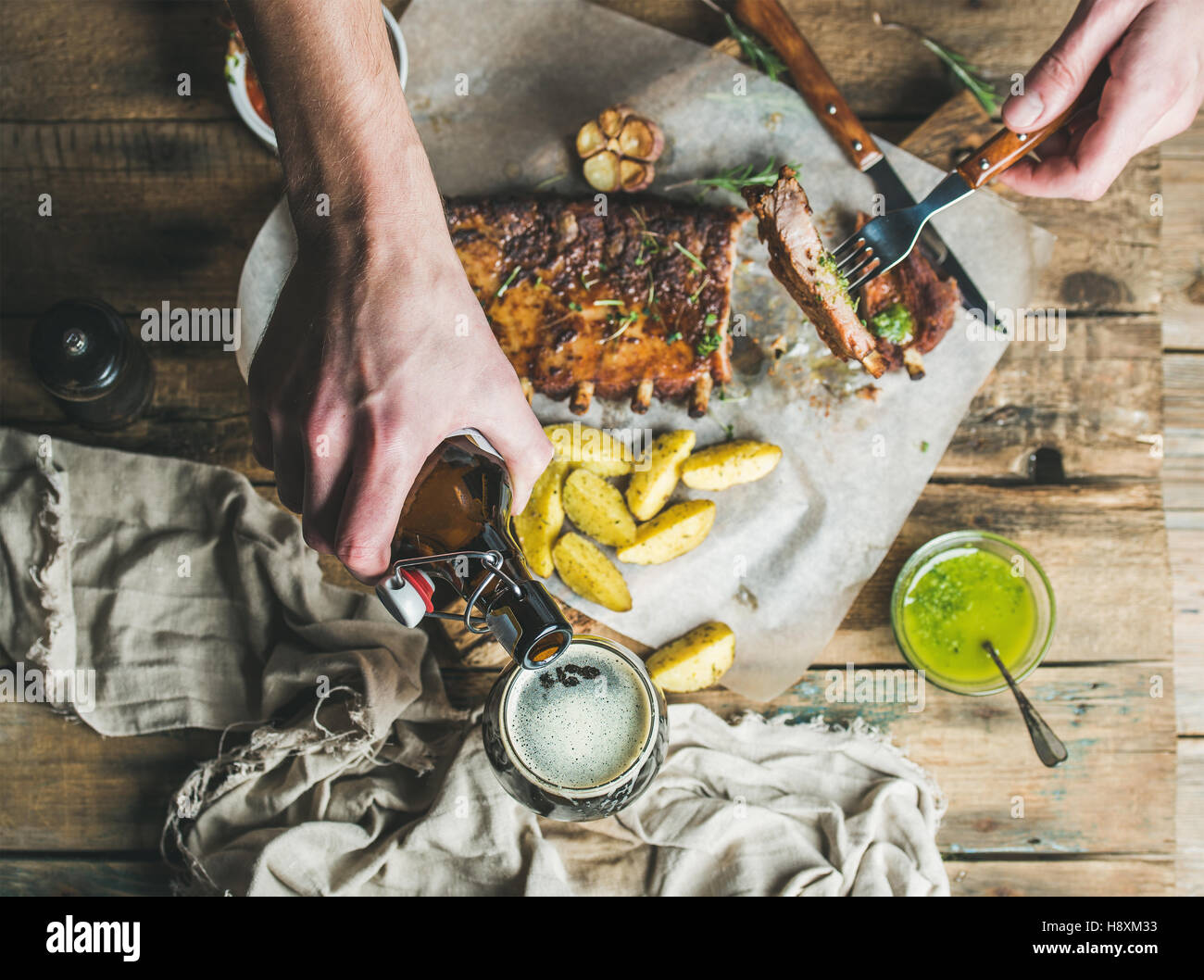 Man eating pork ribs hi-res stock photography and images - Alamy