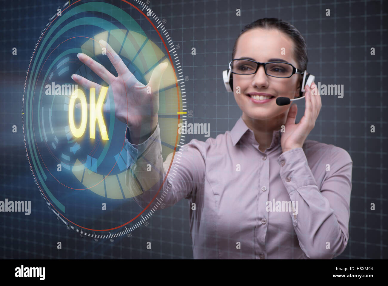 Businesswoman pressing virtual button OK Stock Photo - Alamy