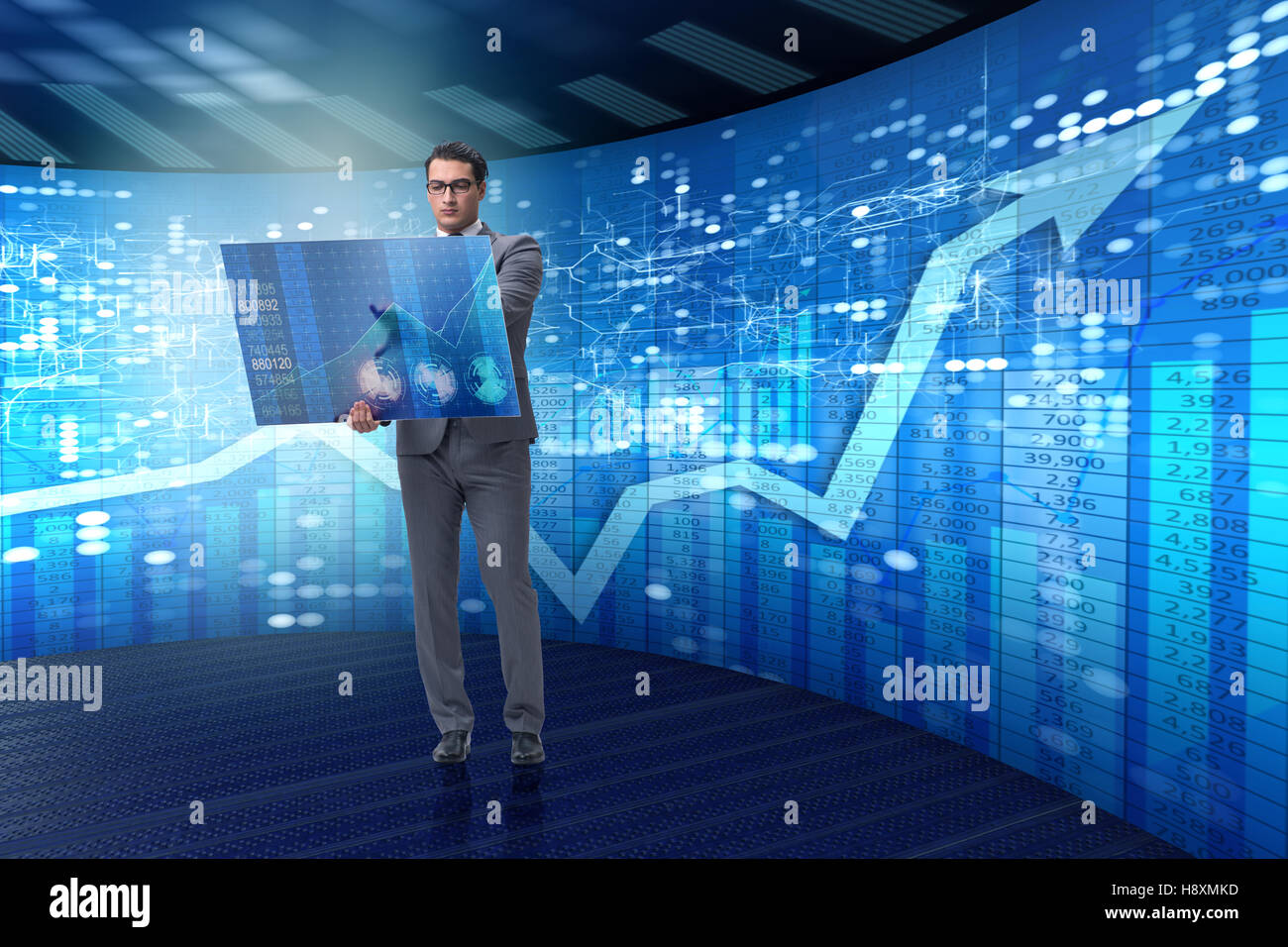 Businessman in stock exchange trading concept Stock Photo - Alamy