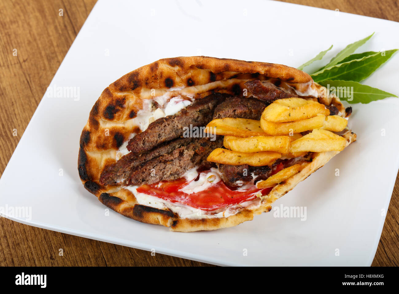 Gyros - tradition Greek cuisine - pork with pita, potato and sauce ...