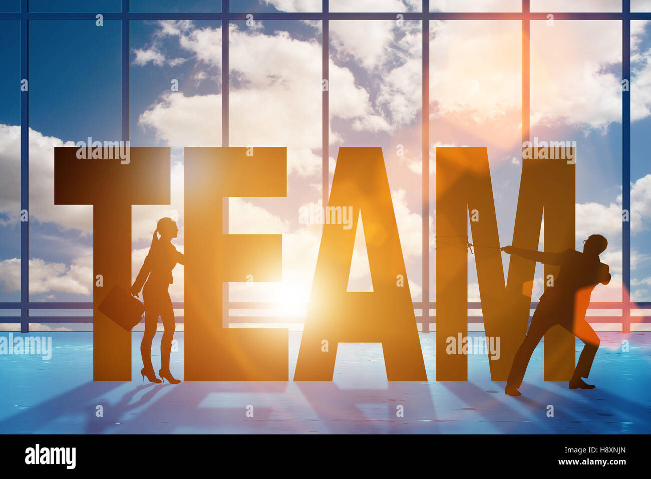 Teamwork concept with the word team Stock Photo - Alamy