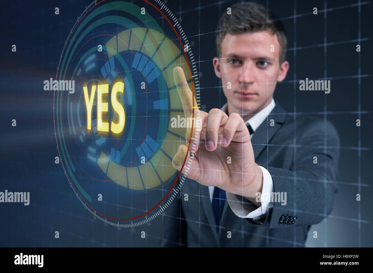 Businessman pressing virtual button YES Stock Photo - Alamy