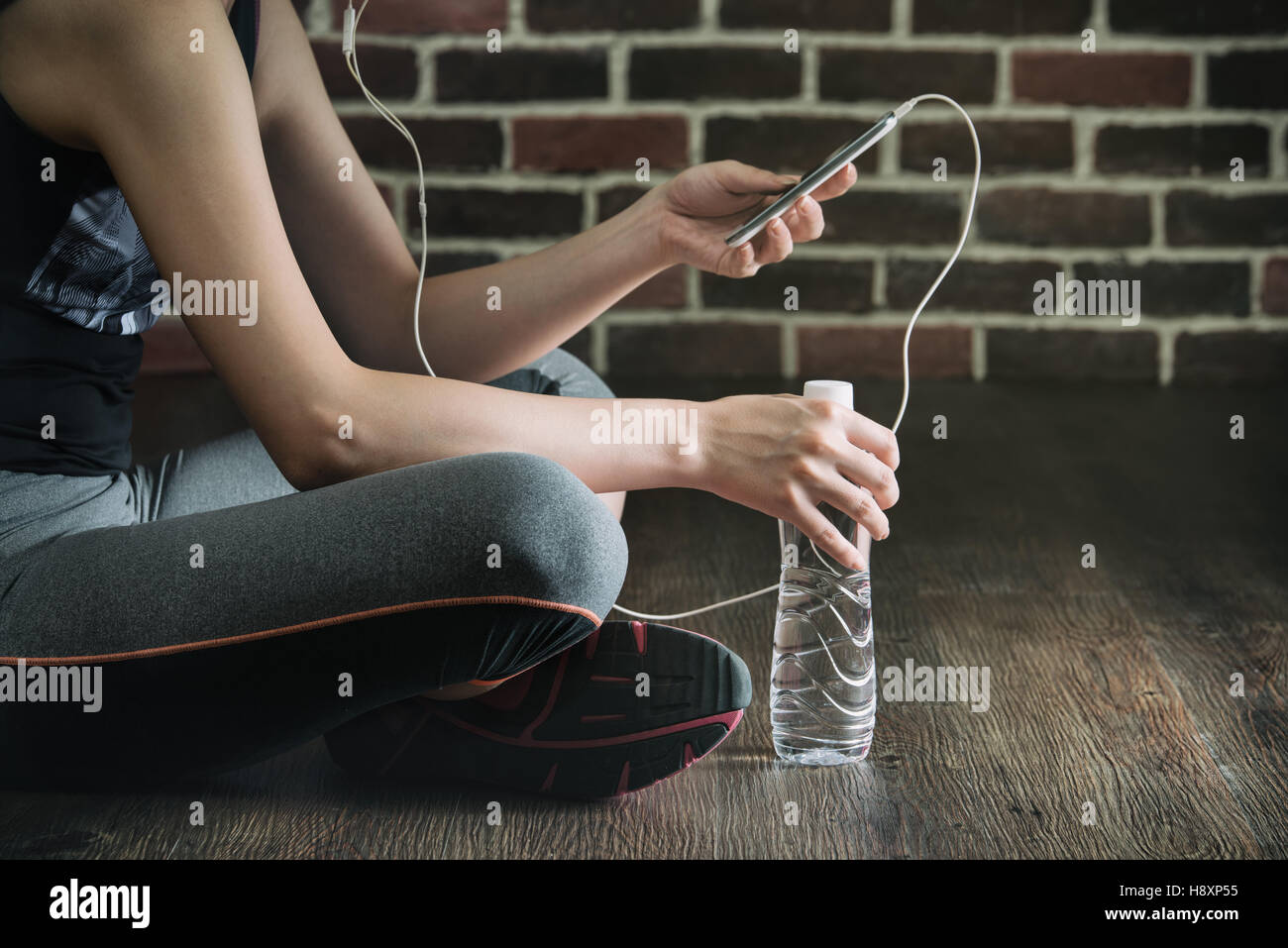 enjoy listen to music drinking water after fitness exercise training ...
