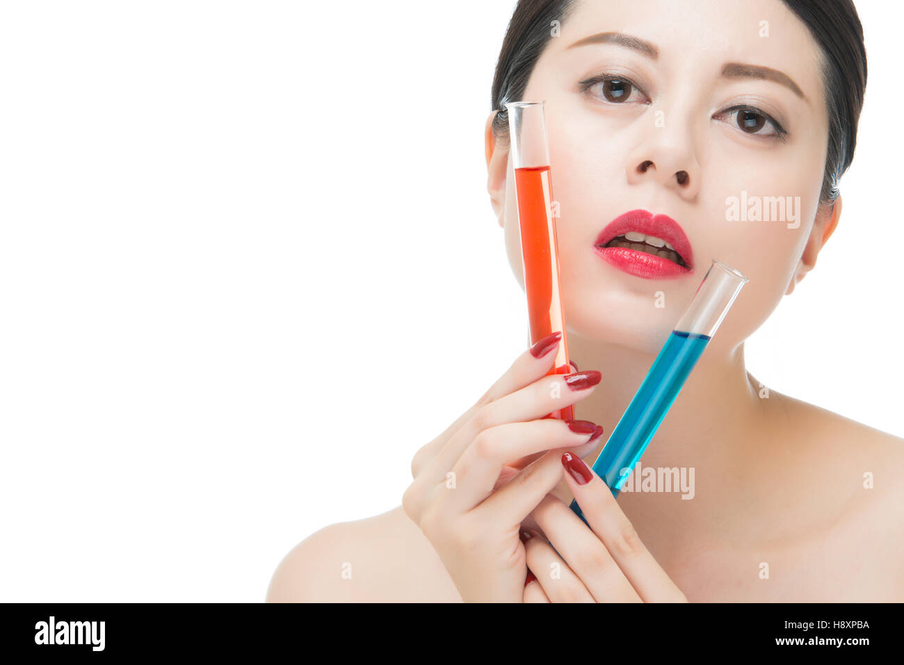 cosmetic just like use toxic chemistry liquid on women face, isolated ...