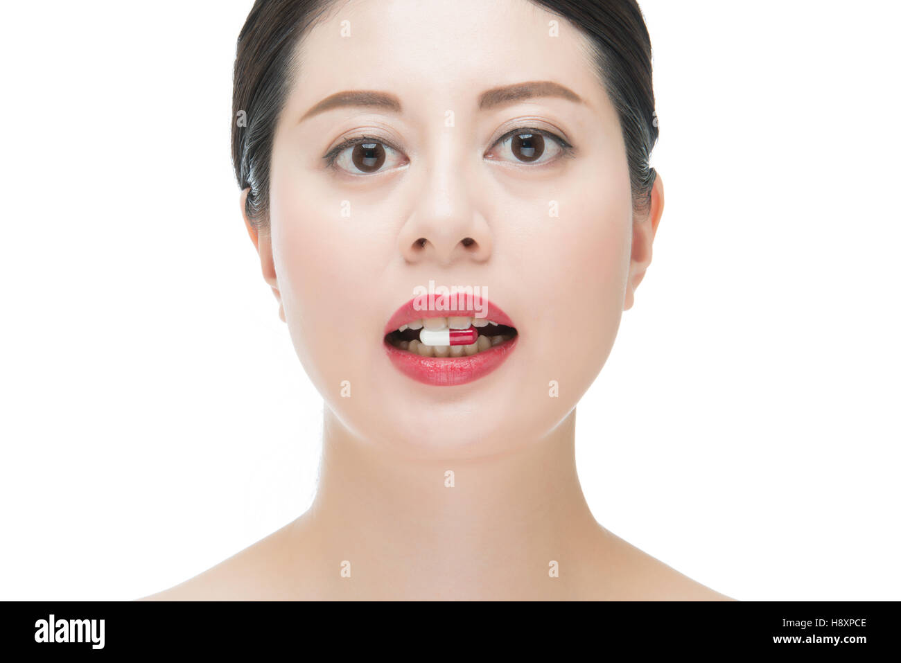 beautiful fashion asian woman bite medicine pill for medical treatment ...