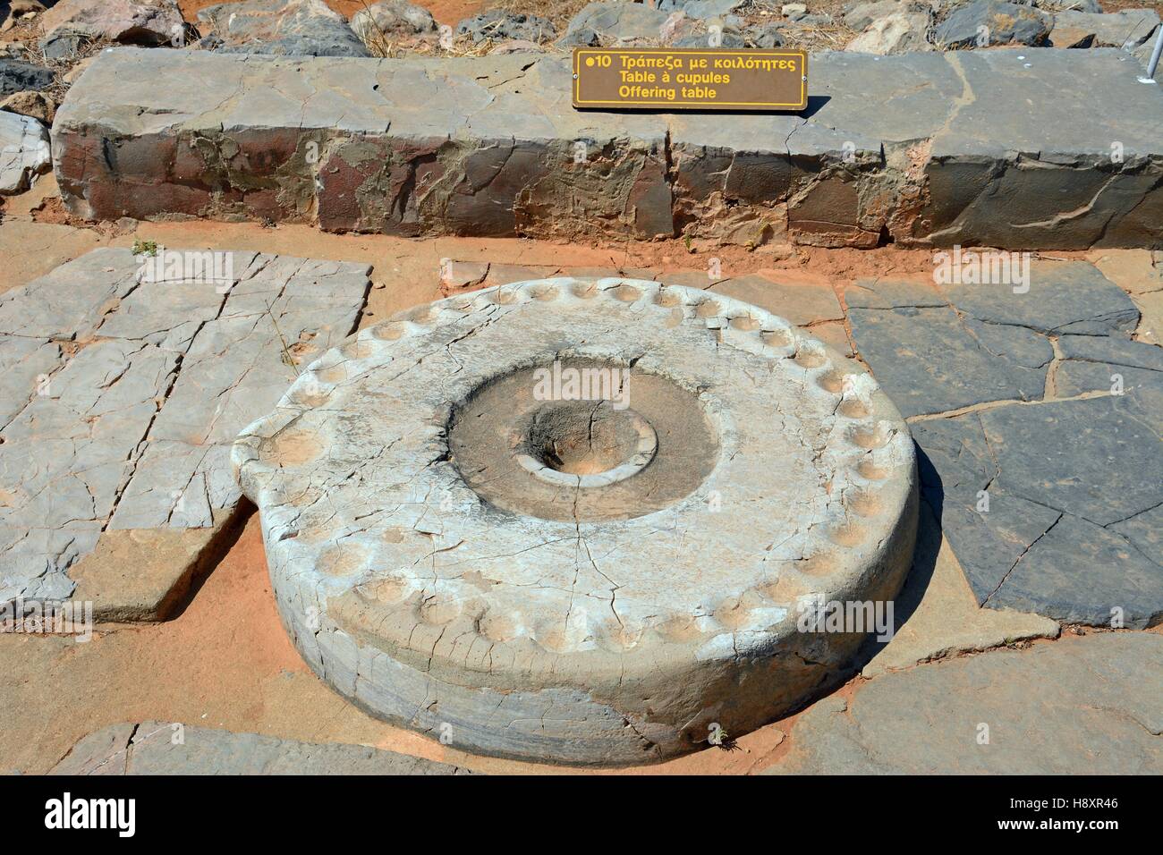 Ancient offering table at the Minoan Malia ruins archaeological site ...