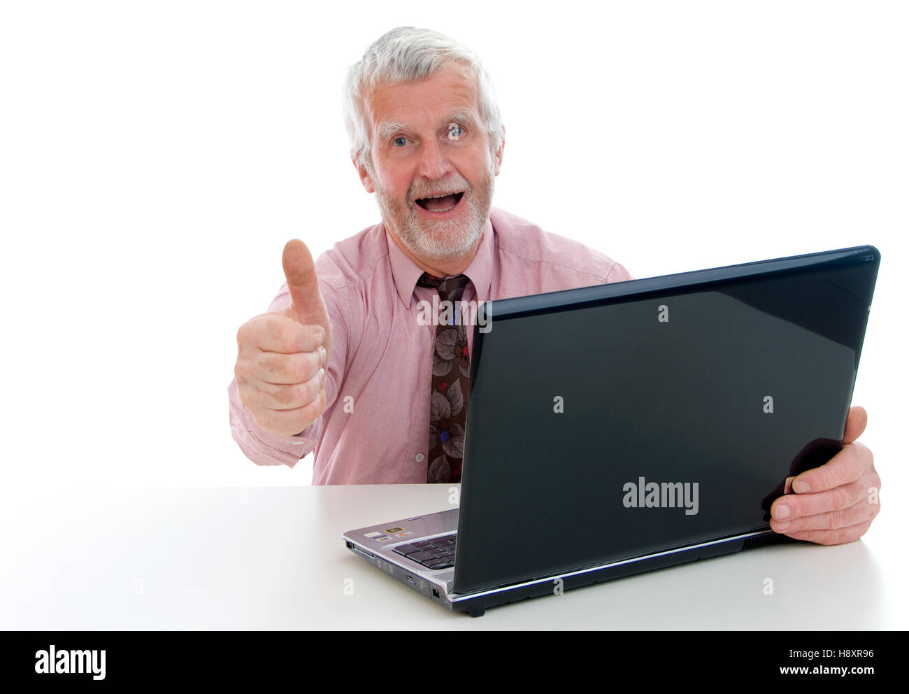 Successful senior citizen, 60+, with a laptop Stock Photo - Alamy