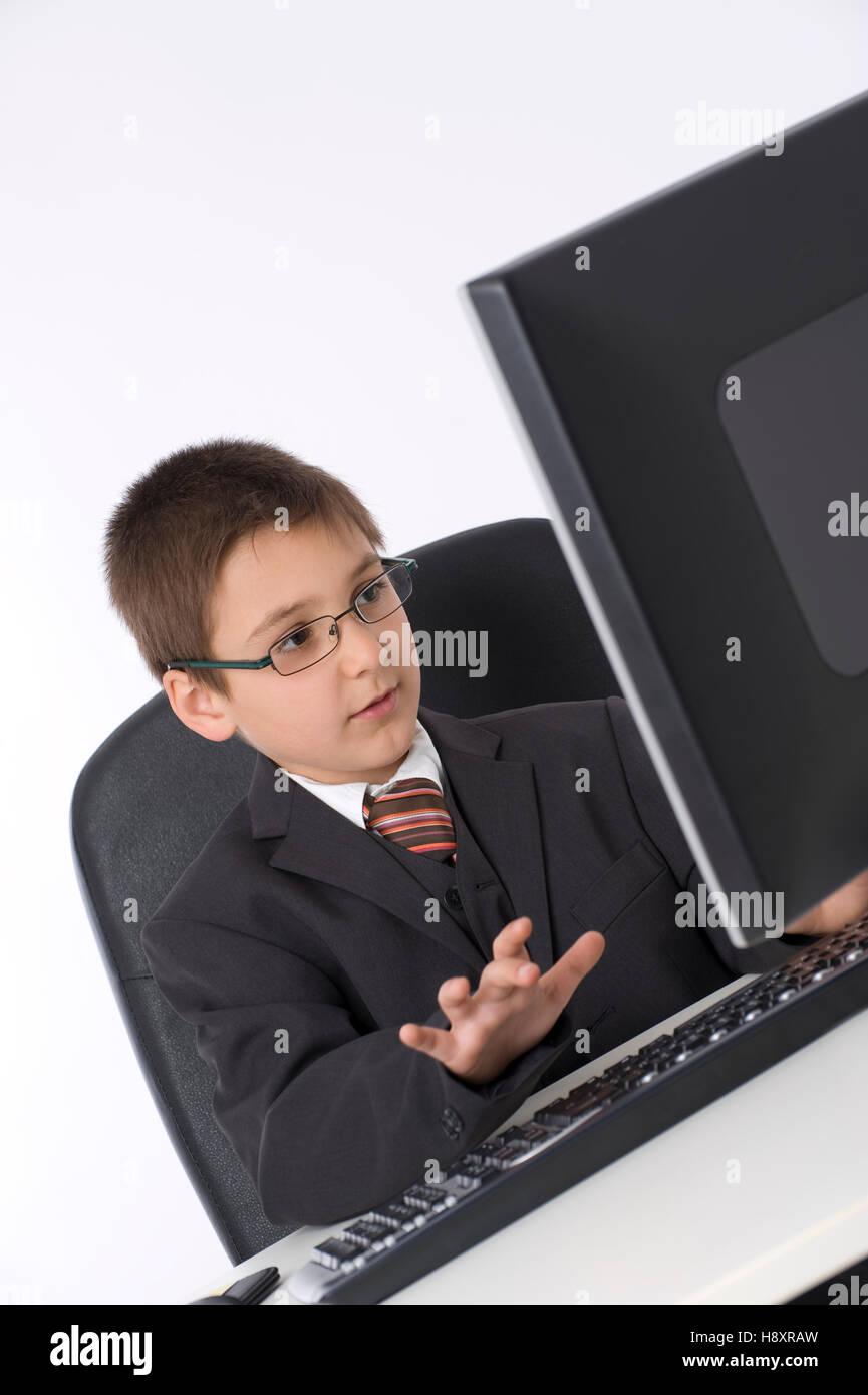 Child boss suit office hi-res stock photography and images - Alamy