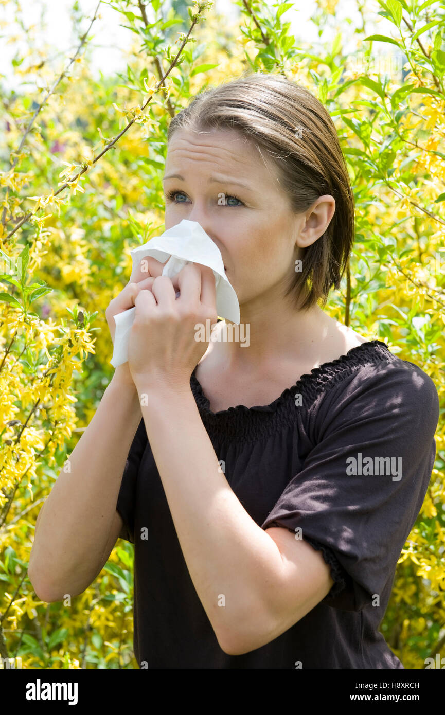 Young woman in spring, hay fever Stock Photo - Alamy