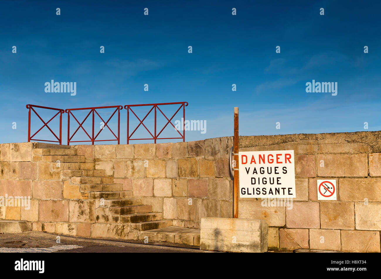 Warning sign, waves, Socoa dyke, Basque Country, France, Europe Stock ...