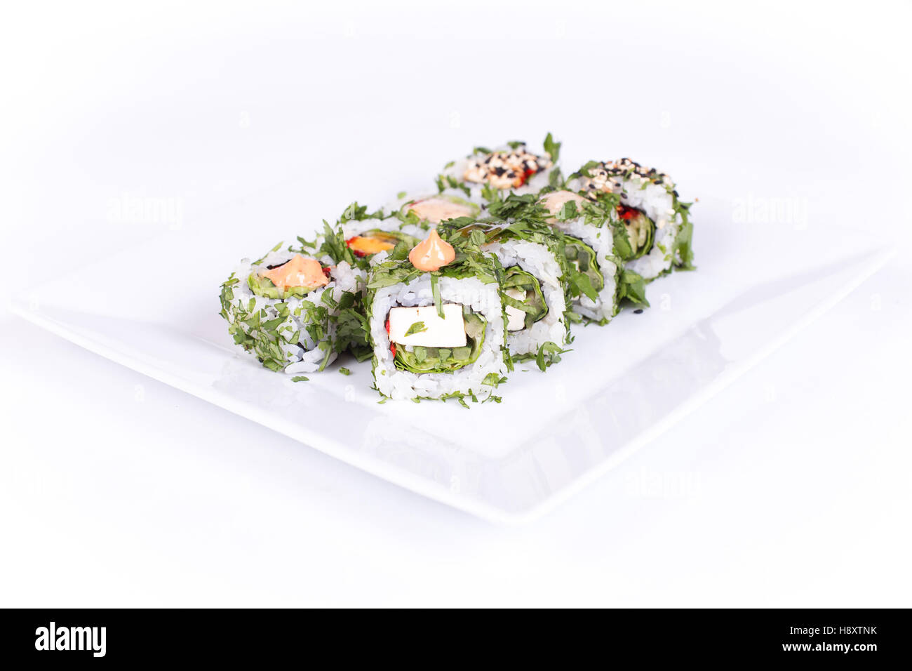 Sushi plate on white background Stock Photo - Alamy