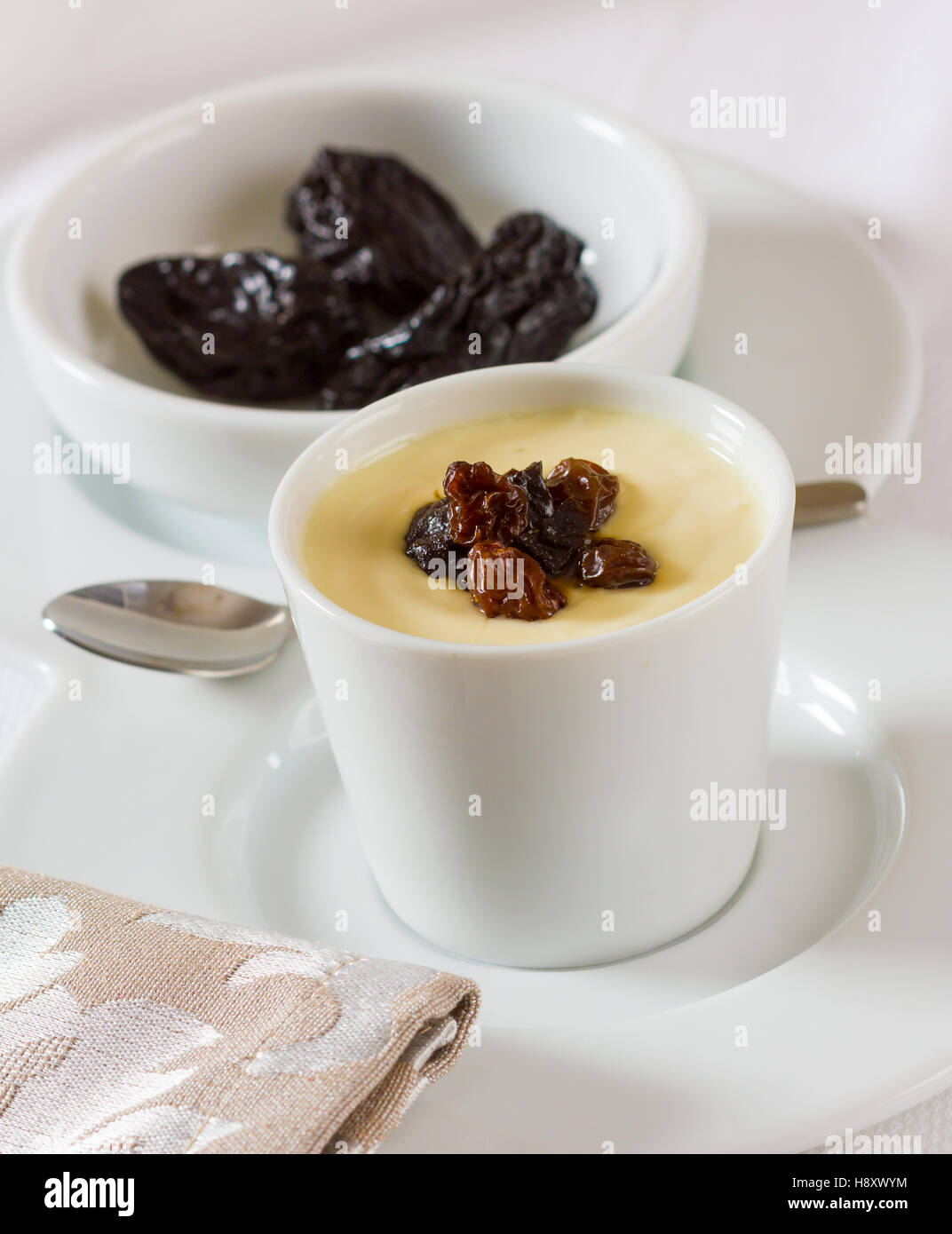 Custard dessert served with fruit hi-res stock photography and images ...