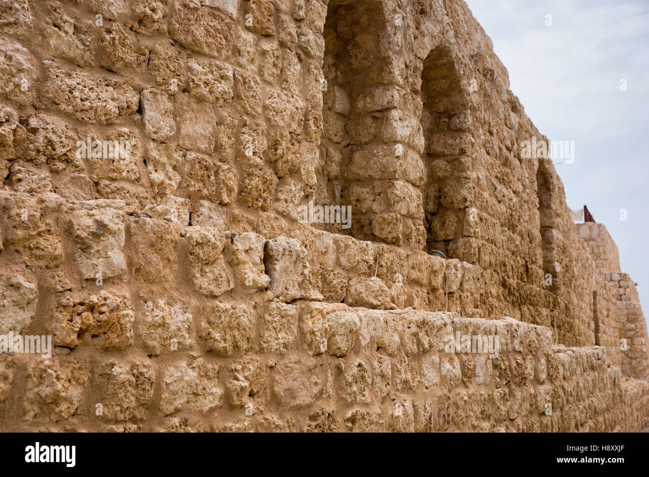 Close up of old stone building in light brown color Stock Photo - Alamy