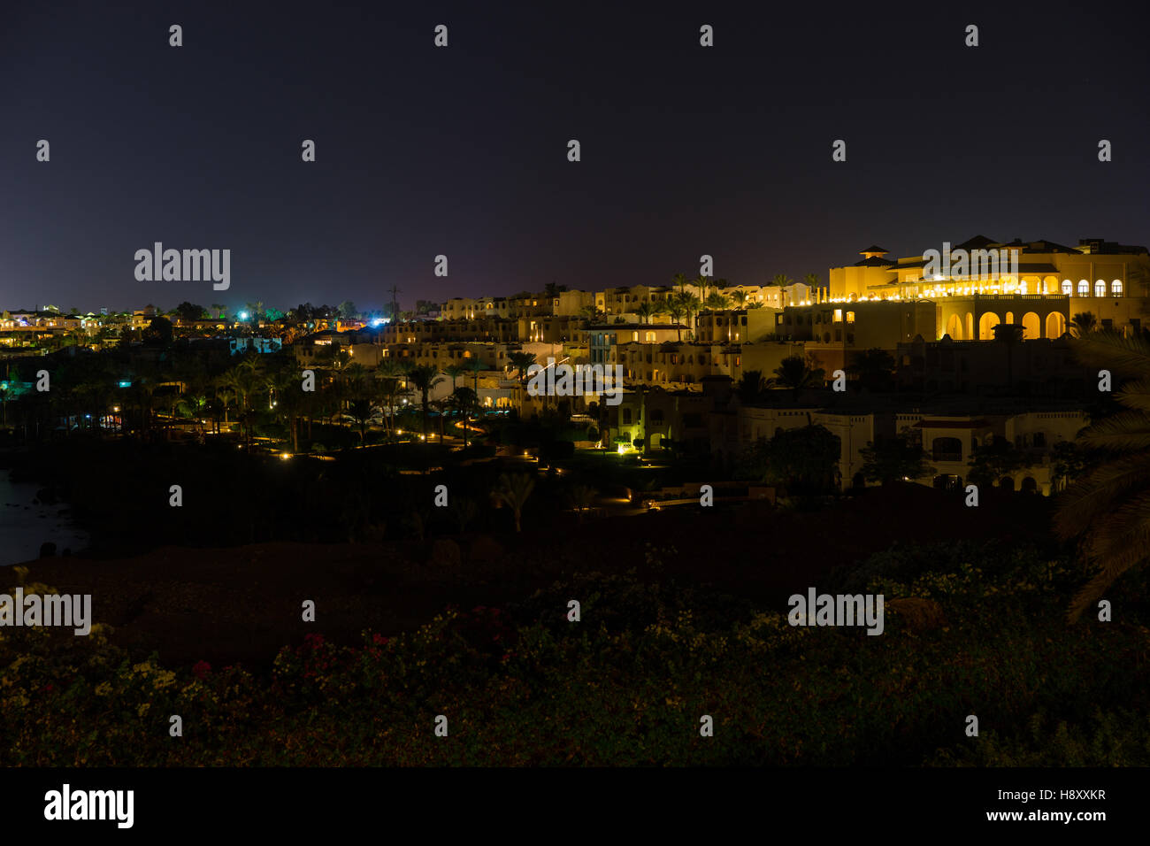 Evening view from sea for luxury hotel in night illumination Stock ...