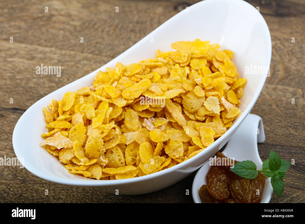 Corn flakes with raisin - dietary fitness breakfast Stock Photo - Alamy