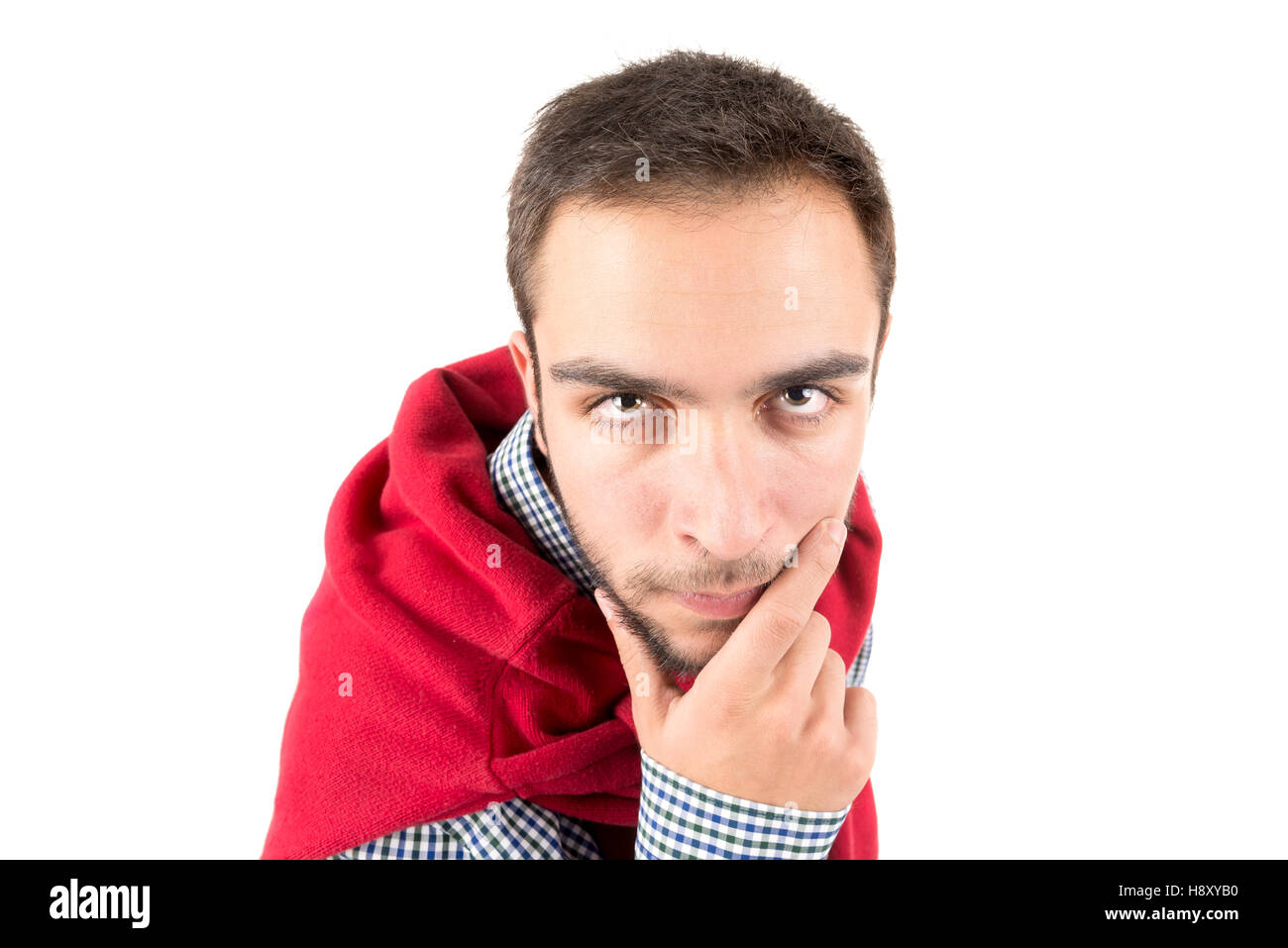 Young nerd thinking isolated in a white background Stock Photo - Alamy