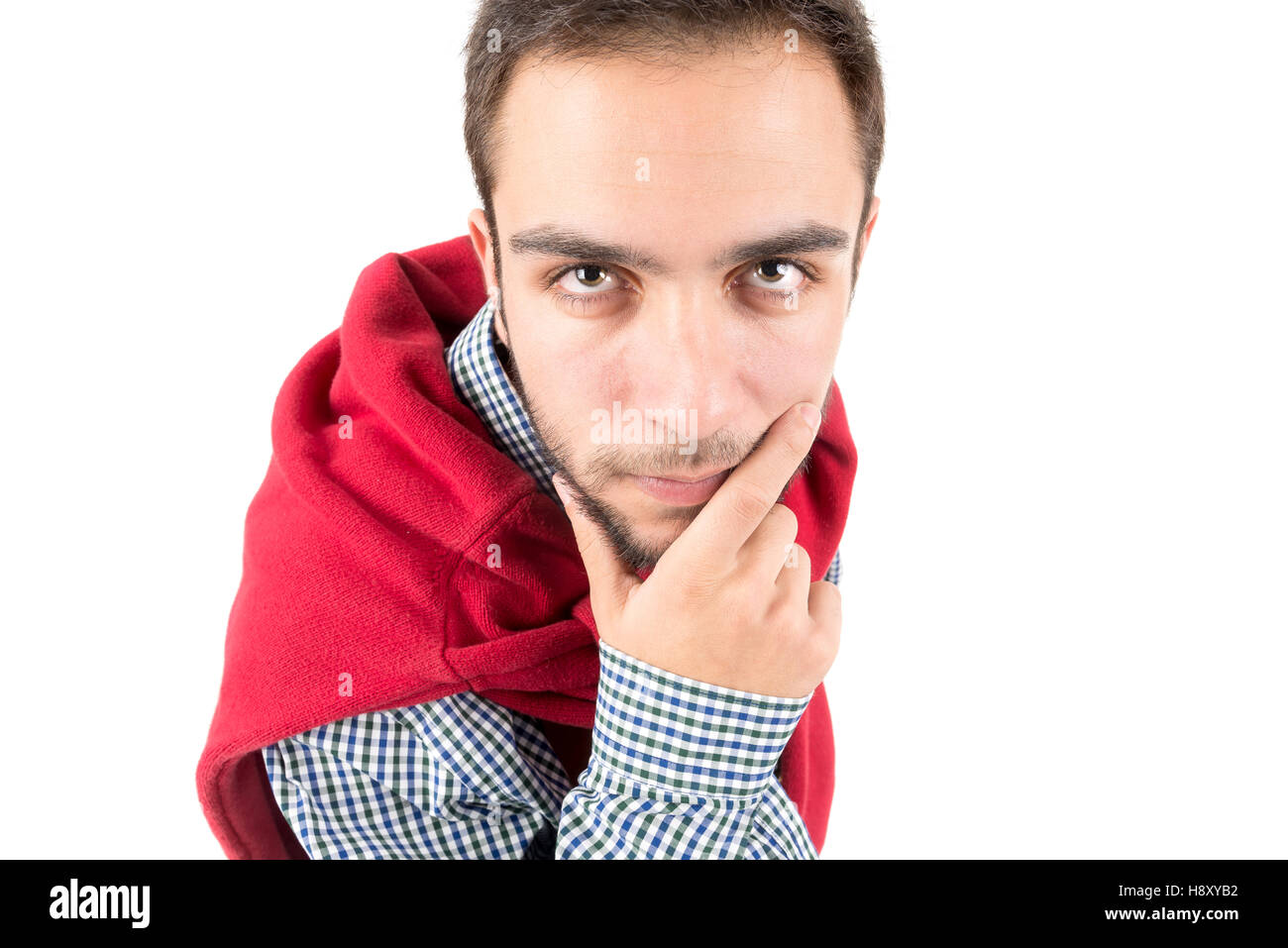 Young nerd thinking isolated in a white background Stock Photo - Alamy
