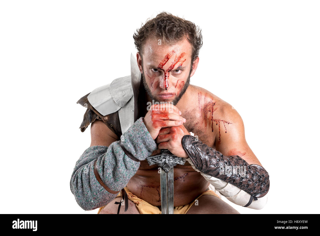 Ancient warrior or Gladiator isolated in a white background Stock Photo ...