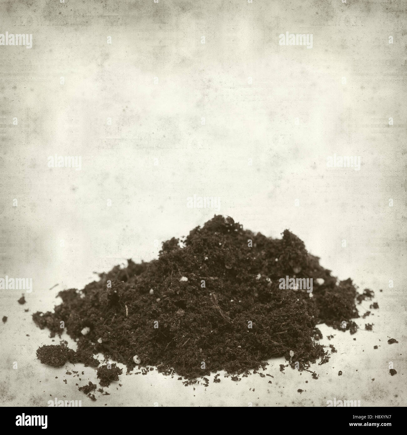 textured old paper background with small heap of compost Stock Photo ...