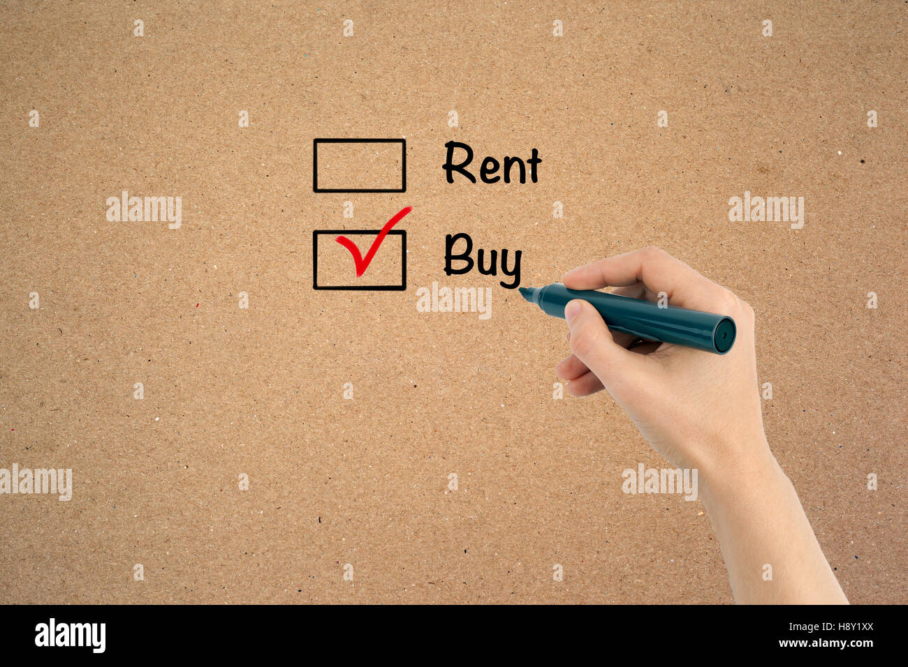 Buy not rent concept on cardboard background Stock Photo - Alamy