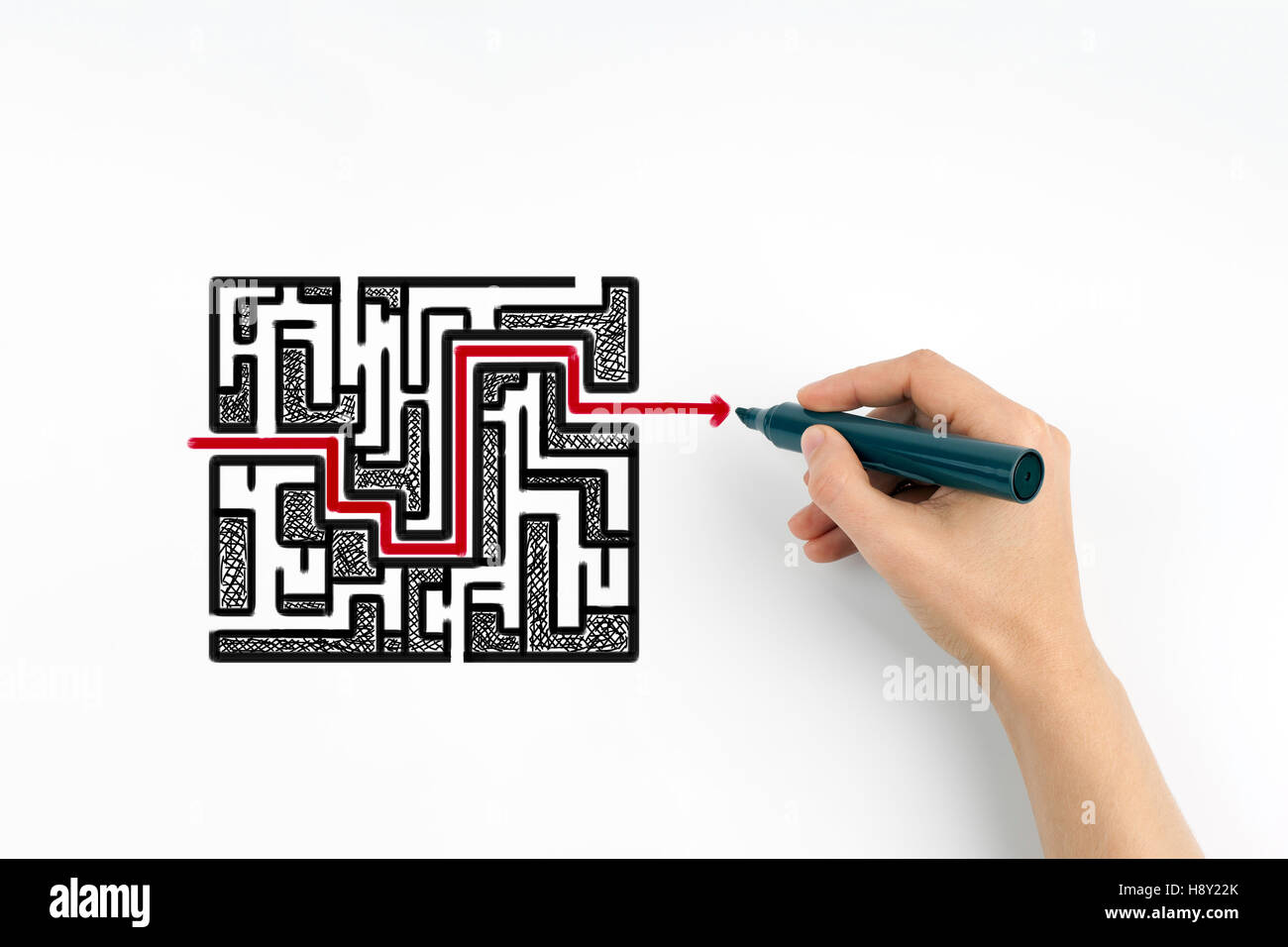 hand drawing maze on a white background Stock Photo - Alamy
