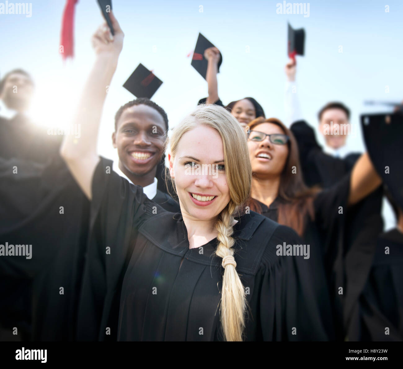 Group Students Hands Raised Graduation Concept Stock Photo - Alamy