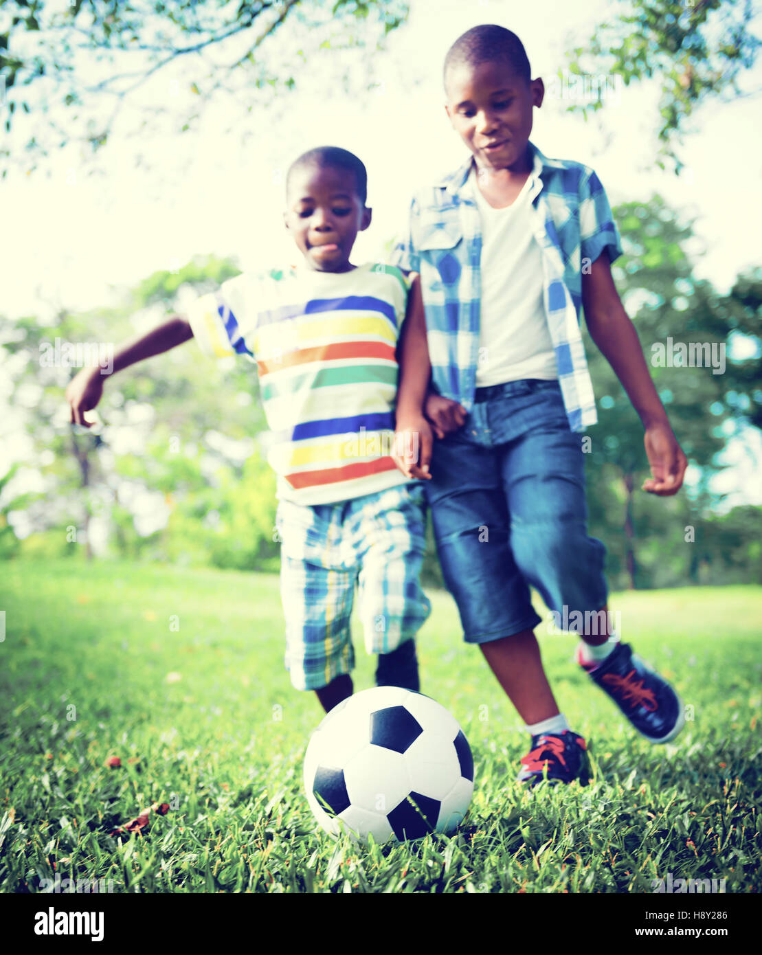 African children playing exercise football hi-res stock photography and ...