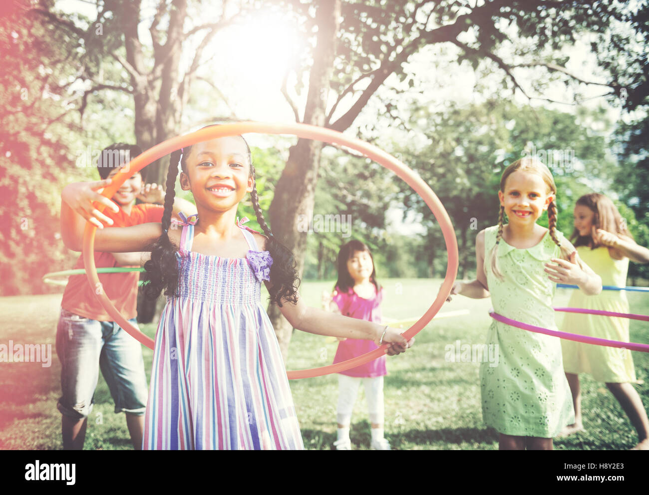Hula hooping children hi-res stock photography and images - Alamy