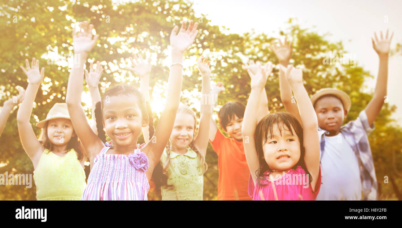 Children Outdoors Playing Cheerful Together Concept Stock Photo - Alamy