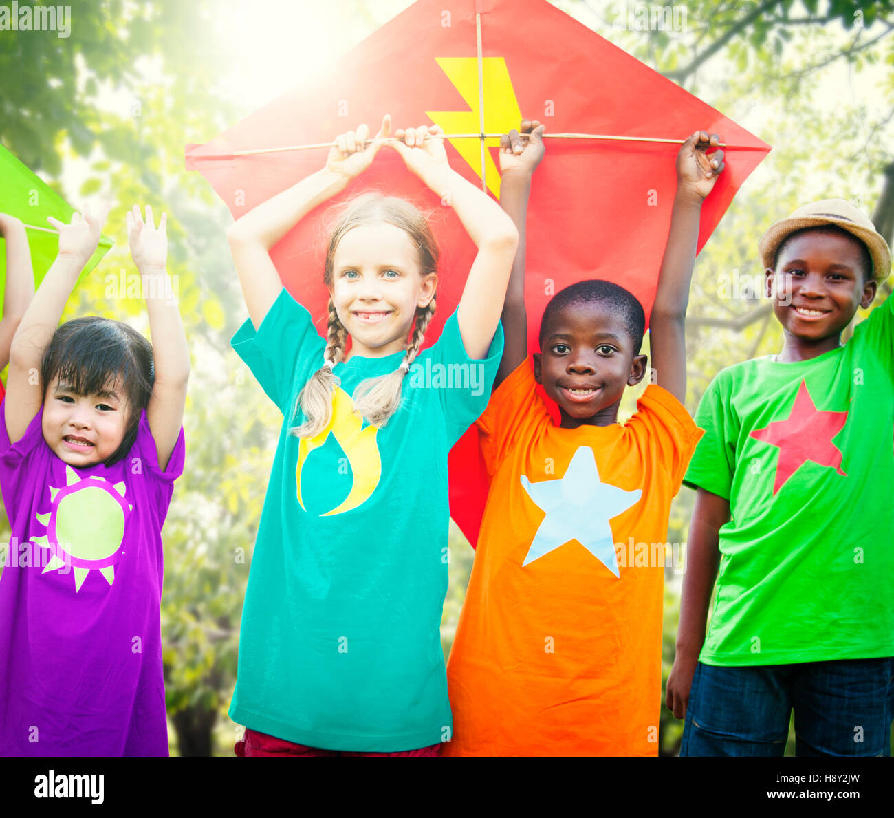 Children Flying Kite Playful Friendship Concept Stock Photo - Alamy