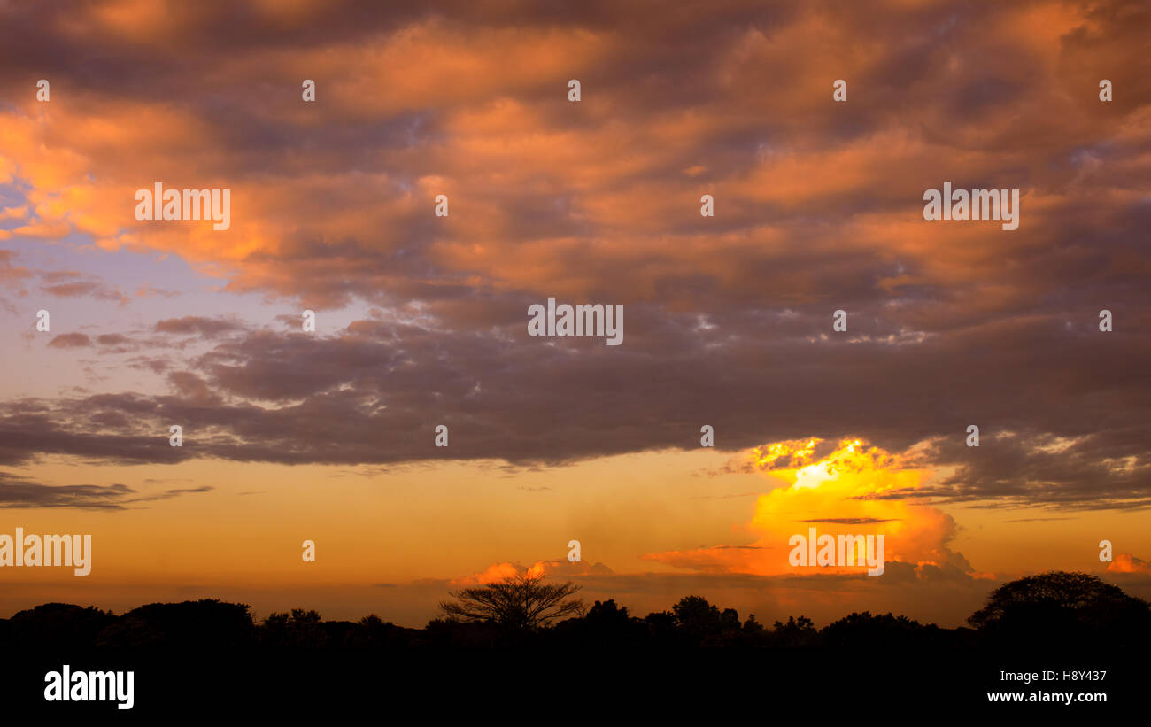 Dramatic twilight sunset and clouds at dusk background Stock Photo - Alamy