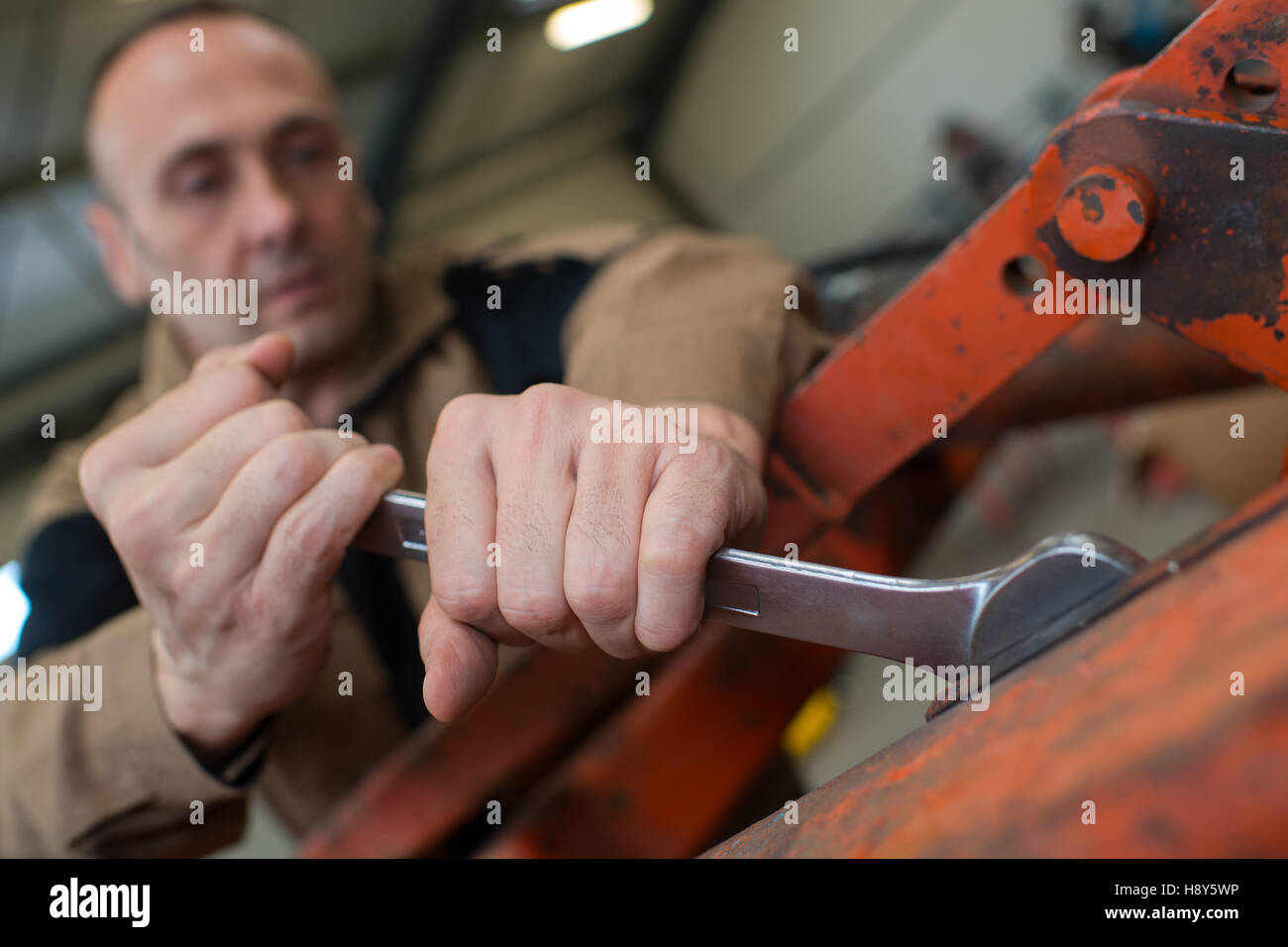 Using a wrench hi-res stock photography and images - Alamy