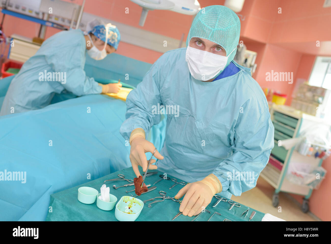 surgeon practicing an operation at an operating theater Stock Photo - Alamy